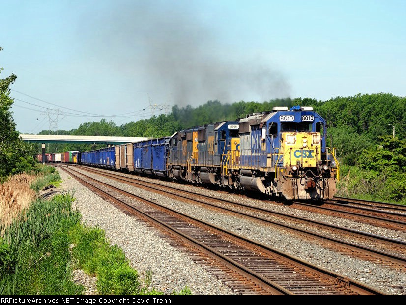 CSX 8010 leads Eastbound CSX Q640 MP126.4 on track number one.